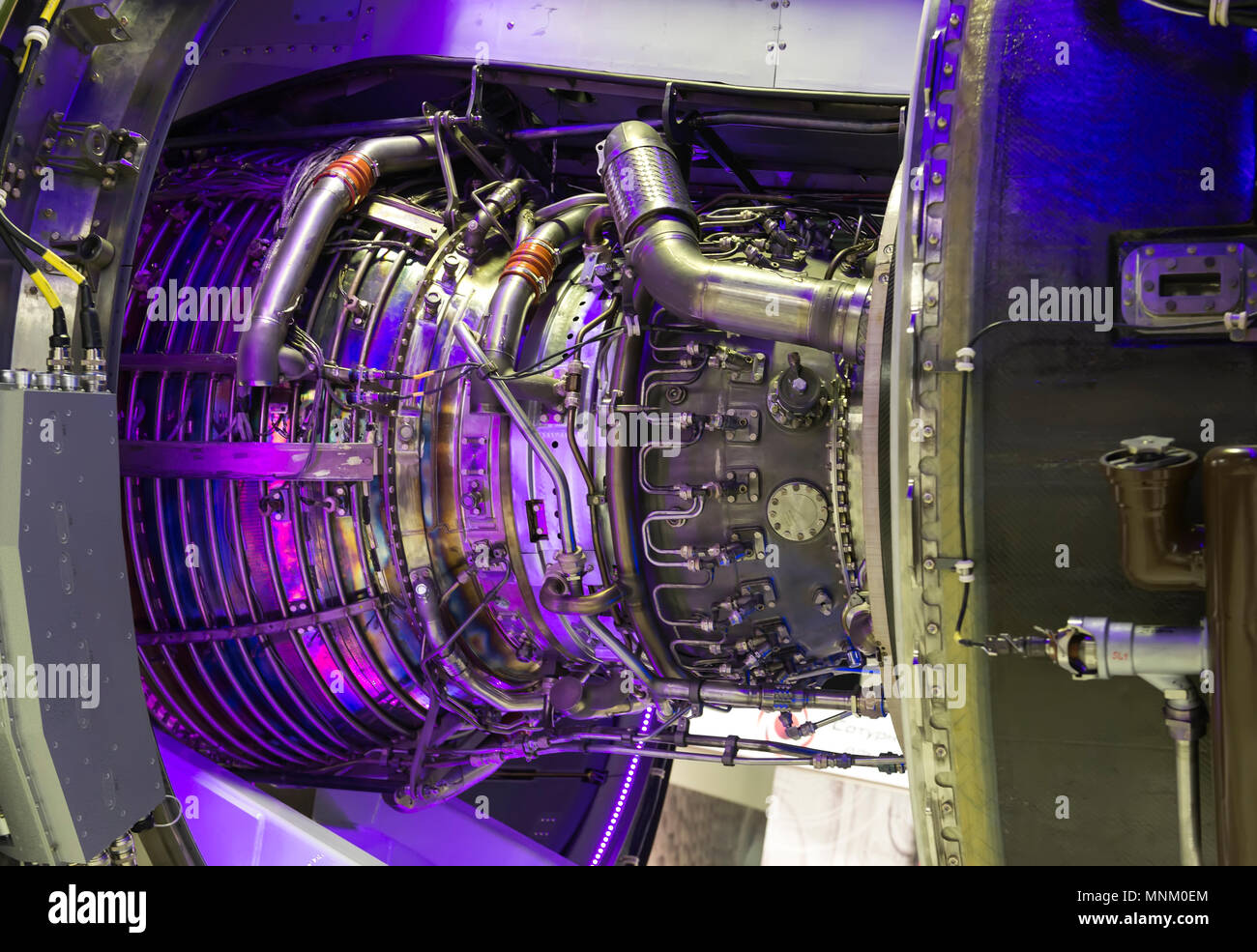plane turbine engine mechanism closeup. violet illumination Stock Photo ...