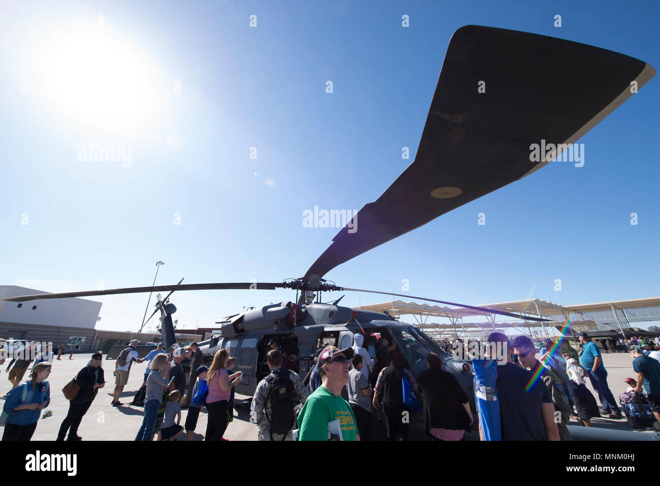 Visitors marvel at static display of the HH-60G Pave Hawk helicopter ...
