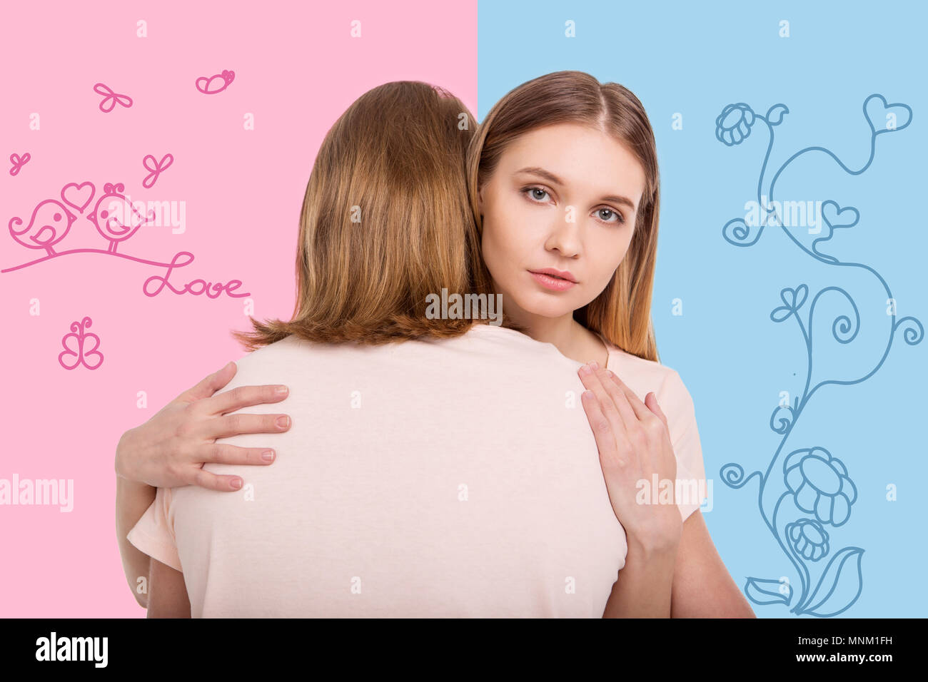 Kind woman feeling good while hugging her beloved man Stock Photo - Alamy