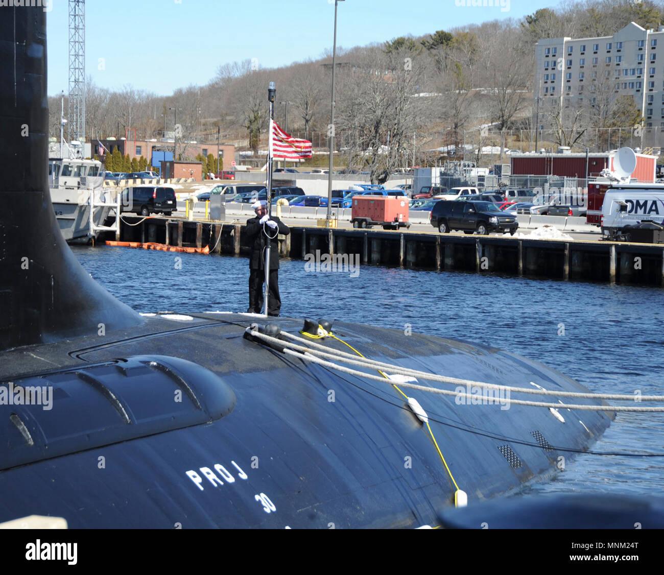 GROTON, Conn. (Mar. 17, 2018) The Union Jack is raised onboard USS ...