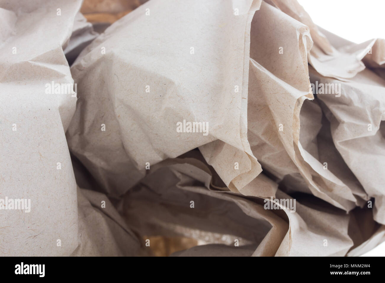 brown paper Filling material for shipping cartons Stock Photo - Alamy