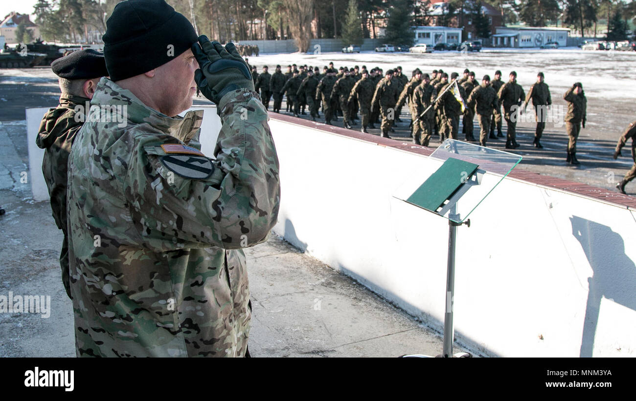 Lt. Col. Eric G. Melloh (left),commander of 2nd Battalion, 70th Armor ...