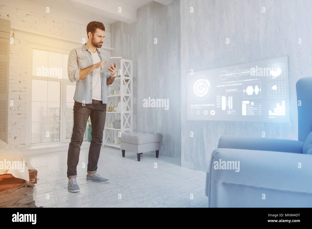 Calm clever man standing hi-res stock photography and images - Alamy