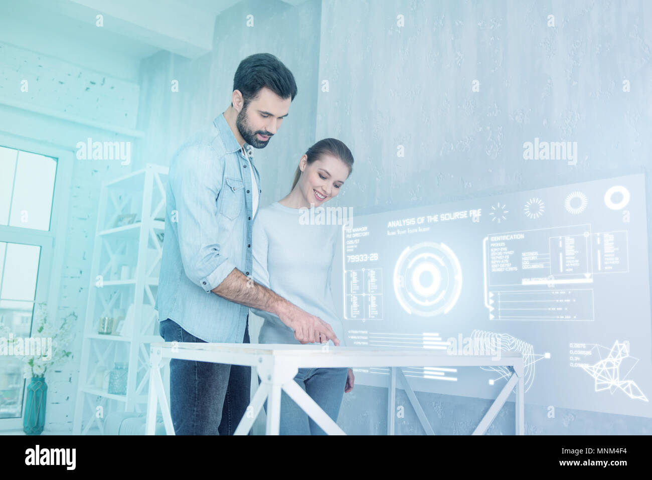 Creative software developers smiling and working together Stock Photo ...