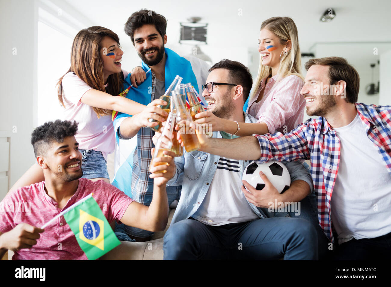 Group fans watching football match hi-res stock photography and images ...