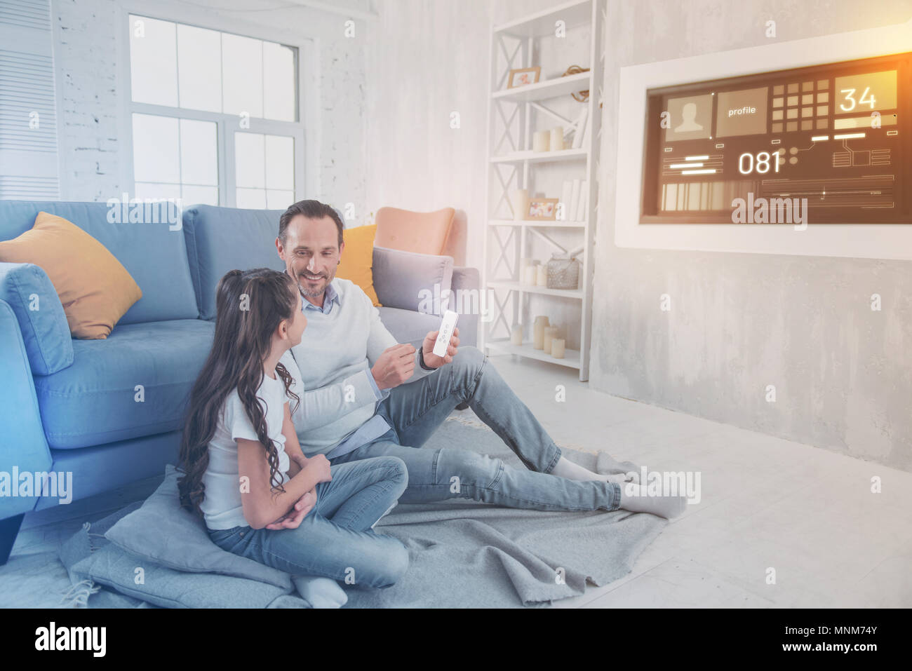 Remote control television kids hi-res stock photography and images - Alamy