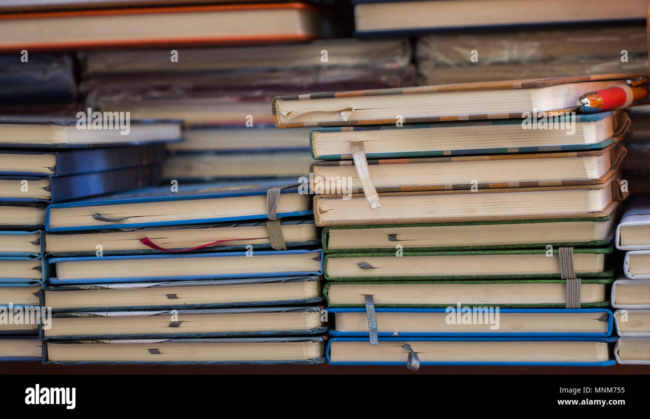Set of color note books in the view Stock Photo - Alamy