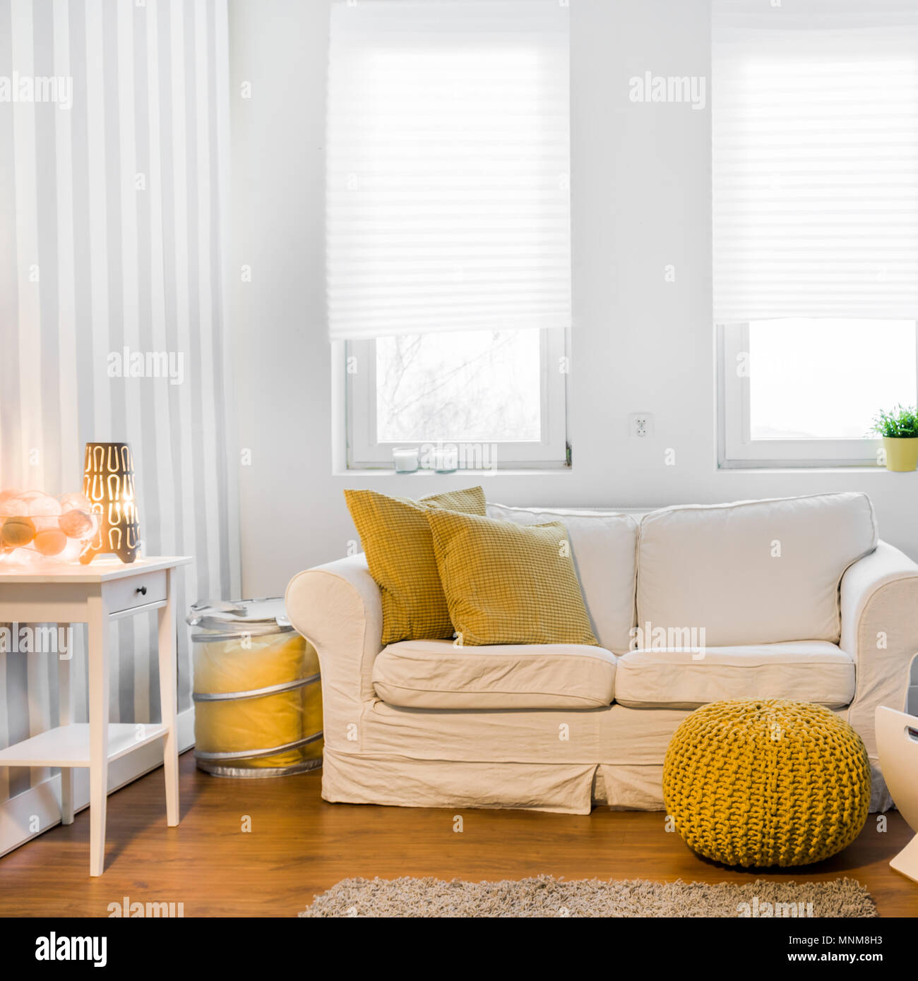 Cozy relaxation space with comfortable couch in modern spacious lounge ...