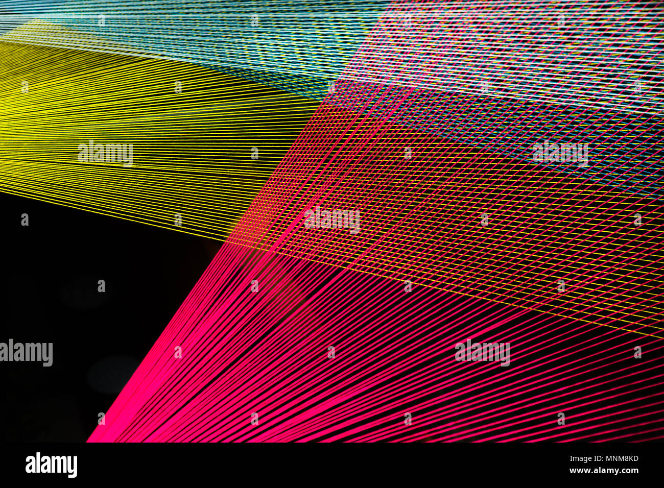 Lines of colourful wool strings as an artistic display Stock Photo - Alamy