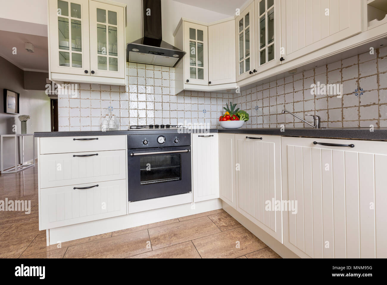 Small functional kitchen interior with stylish furniture and modern ...