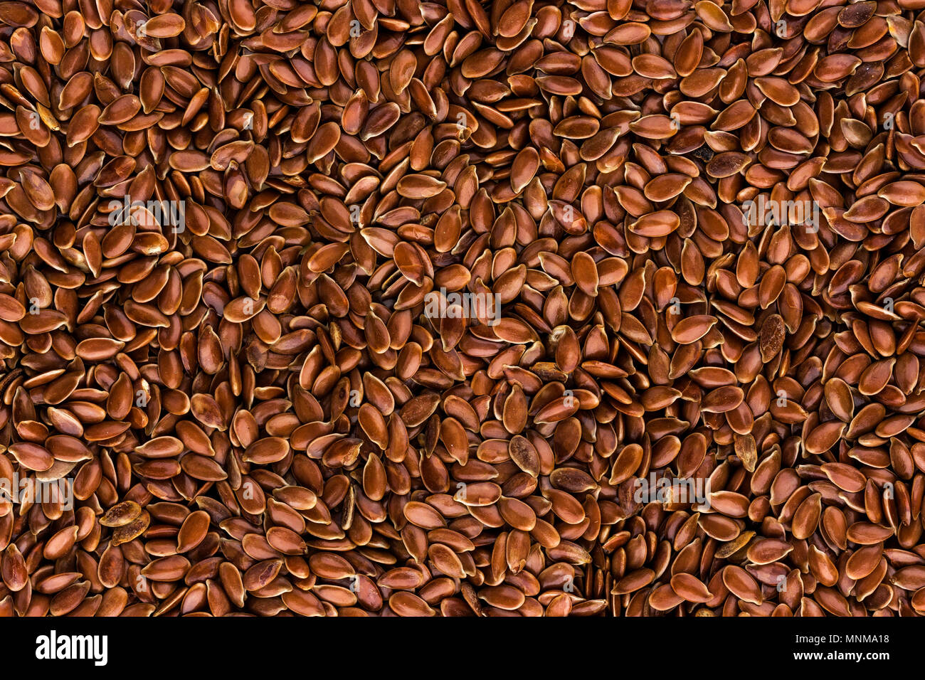 Flax seeds background, linseed texture close-up, top view Stock Photo ...
