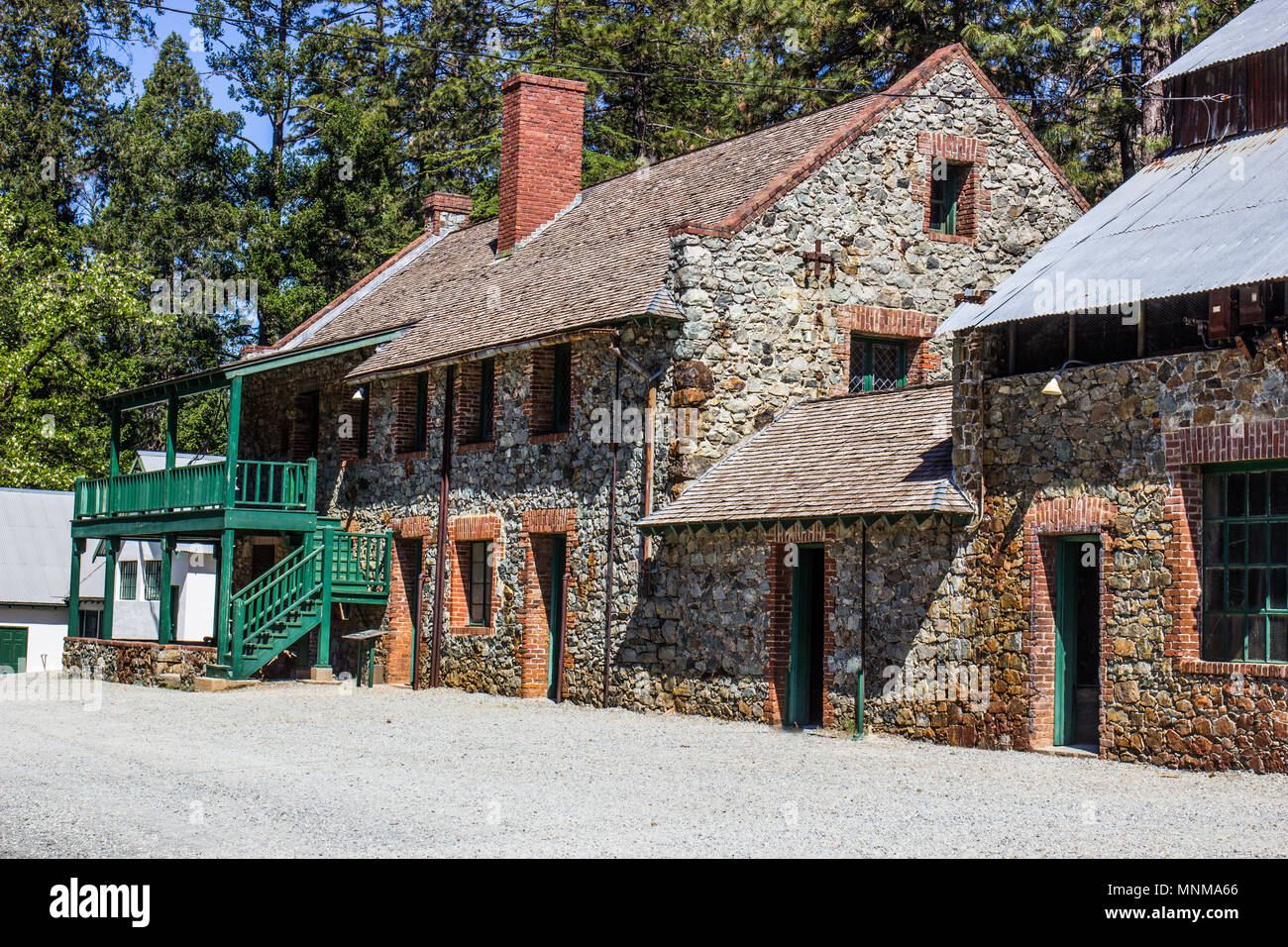 Vintage Rock Building With Stairway Stock Photo - Alamy