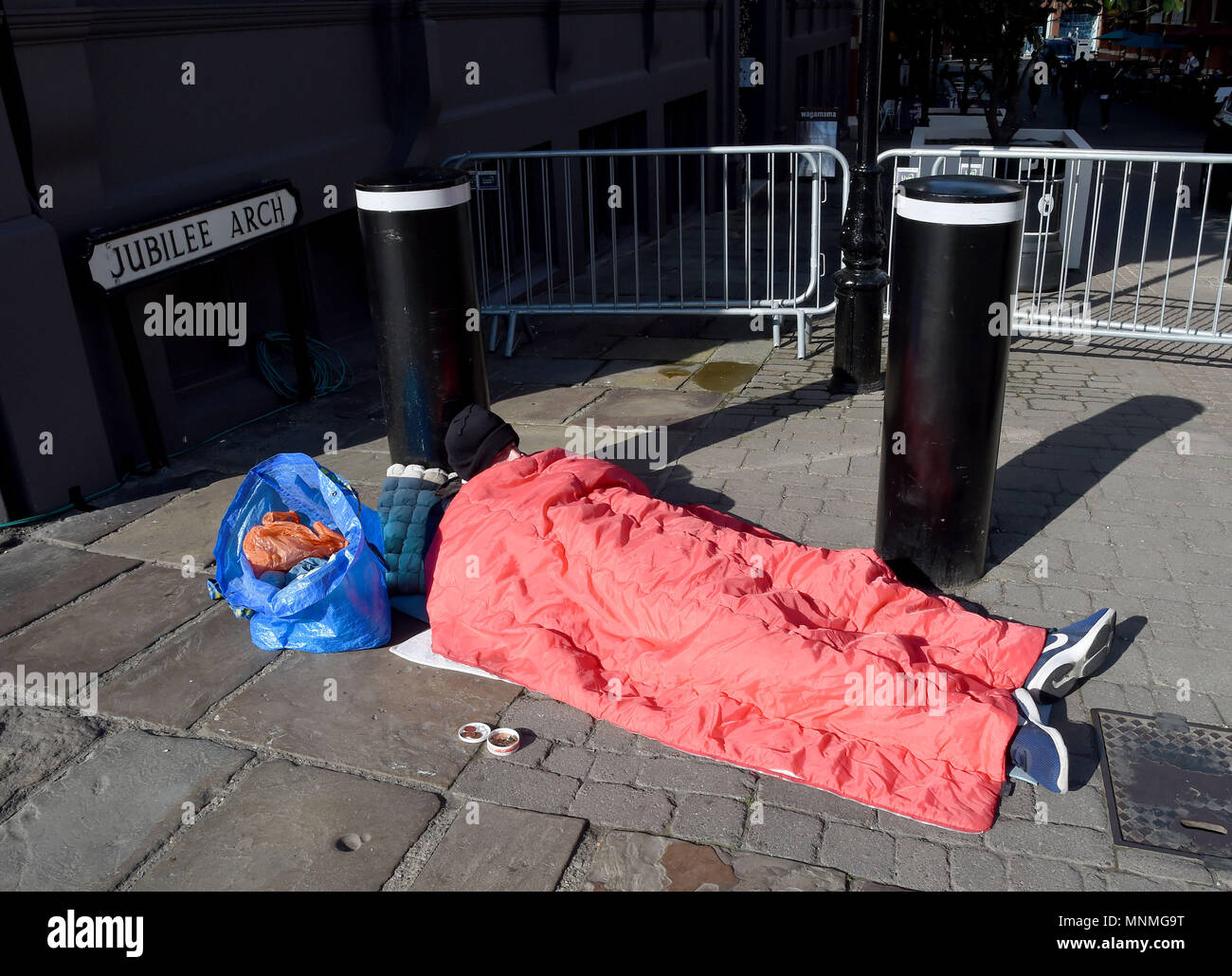 Homeless person asleep outside Windsor Castle Credit: Finnbarr Webster ...