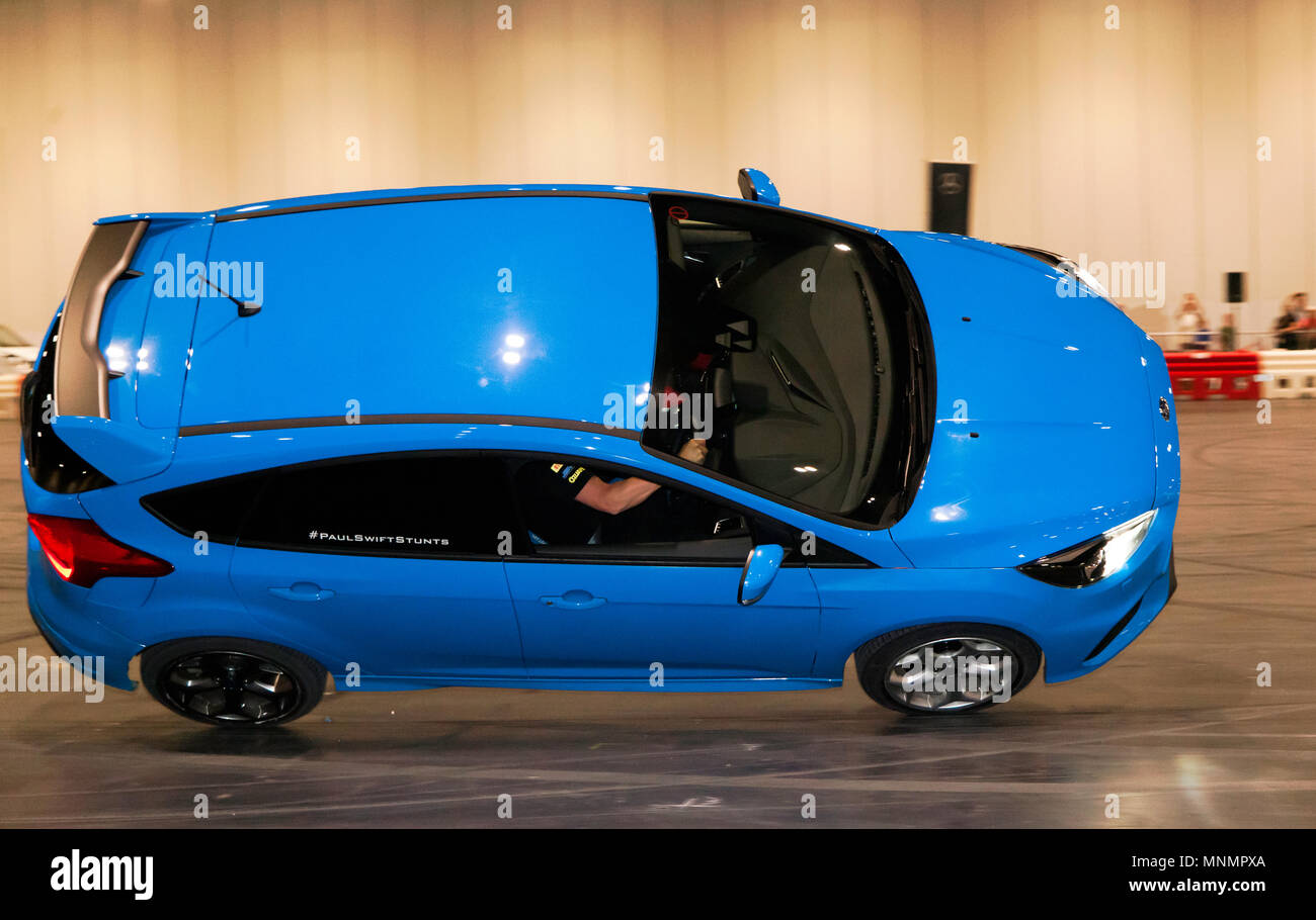 Stunt driver, Paul Swift drives his Ford Focus RS on two wheels, during ...