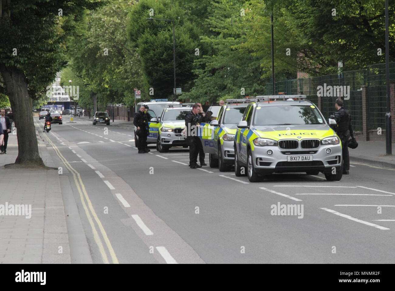 Armed police raid hi-res stock photography and images - Alamy