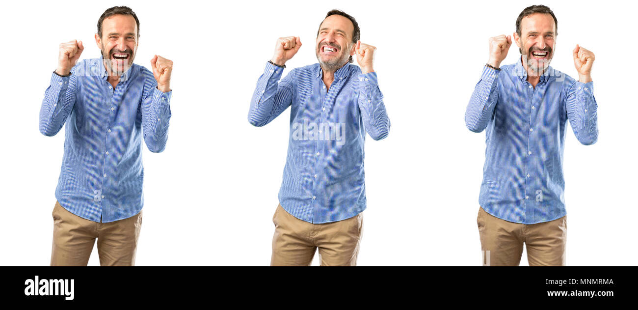 Middle age handsome man happy and excited expressing winning gesture ...