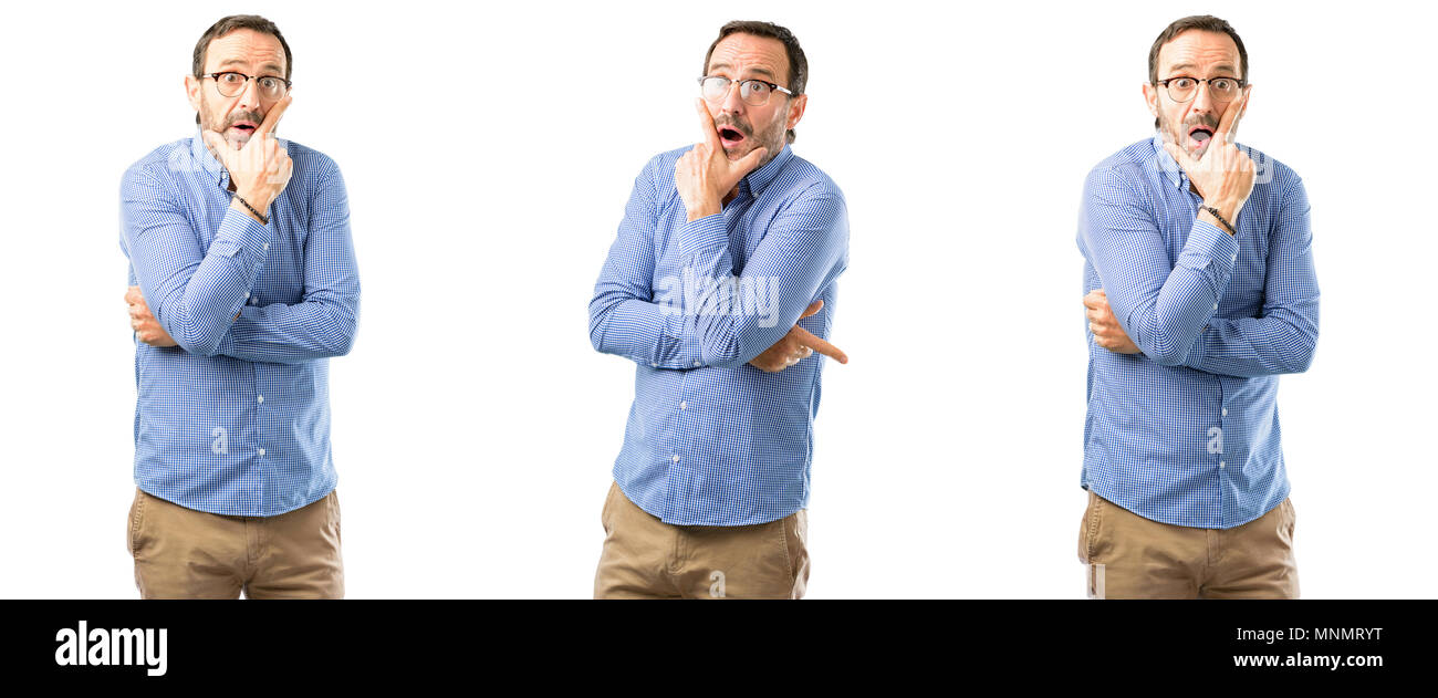 Middle age handsome man scared in shock, expressing panic and fear over ...