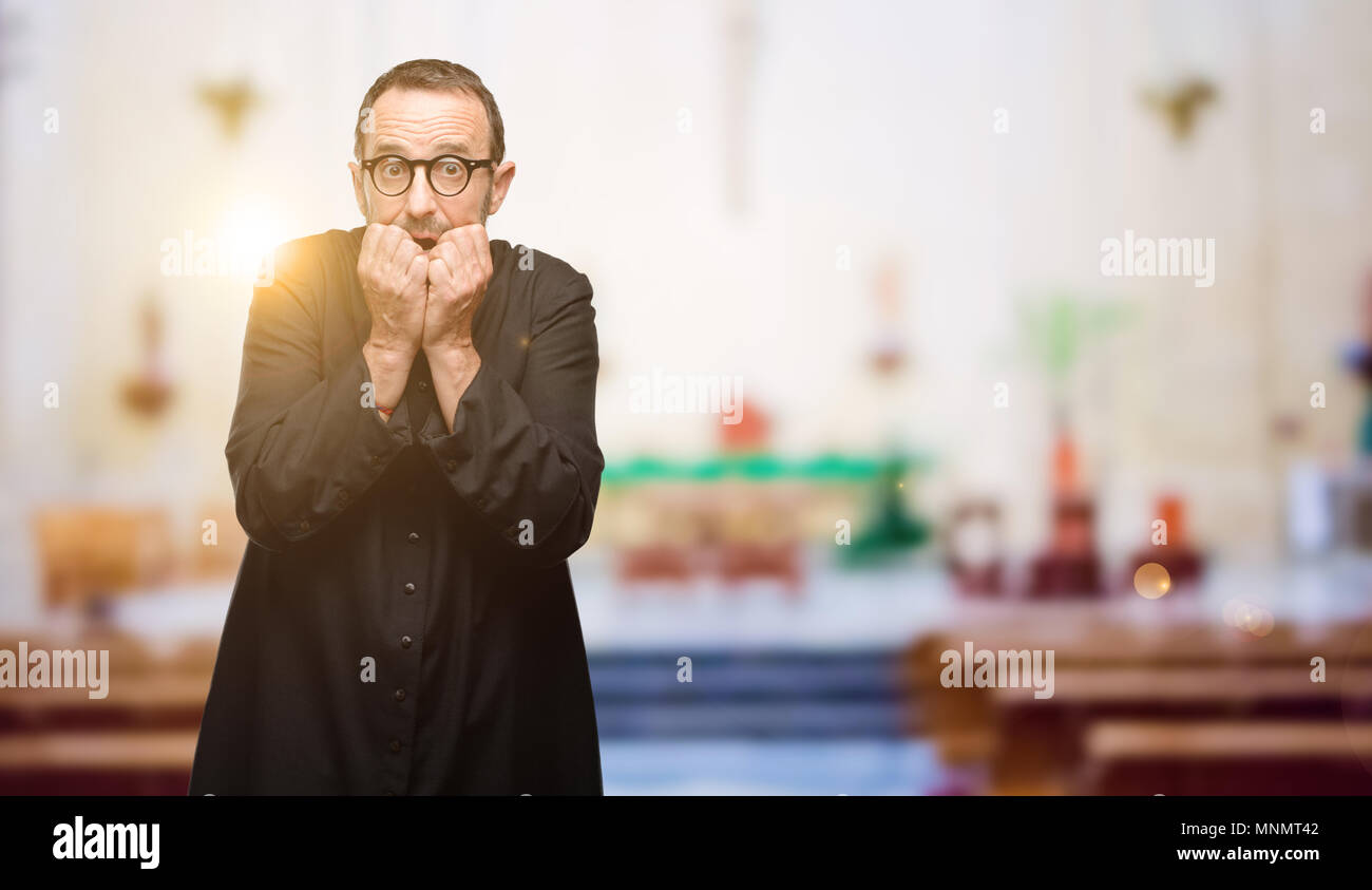 Priest religion man terrified and nervous expressing anxiety and panic ...