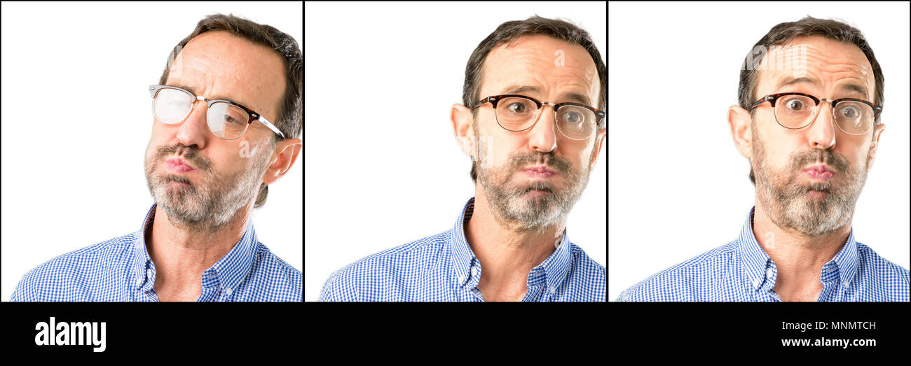 Middle age handsome man closeup puffing out cheeks, having fun making ...