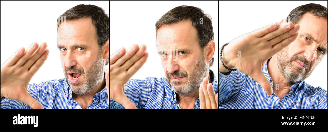 Middle age handsome man closeup confident and happy showing hands to ...