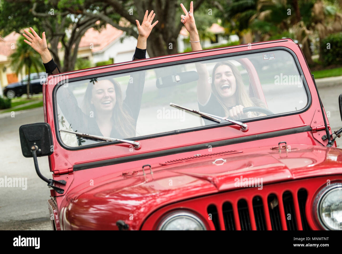 Women driving red convertible hi-res stock photography and images - Alamy