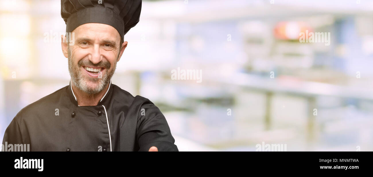 Cook kitchen shaking hands hi-res stock photography and images - Alamy