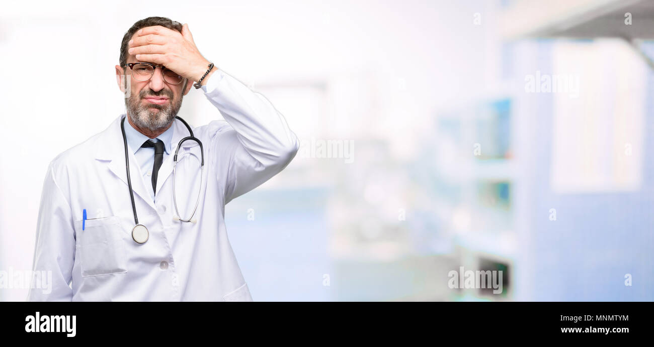Doctor senior man, medical professional terrified and nervous ...