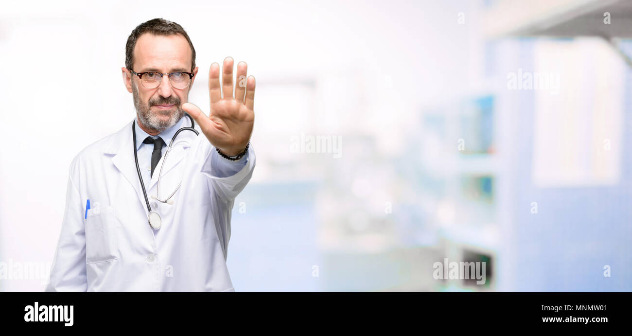 Doctor senior man, medical professional annoyed with bad attitude ...