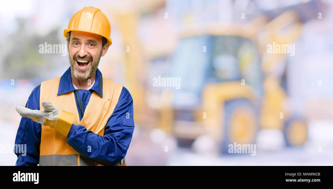 Senior engineer man, construction worker holding something in empty ...