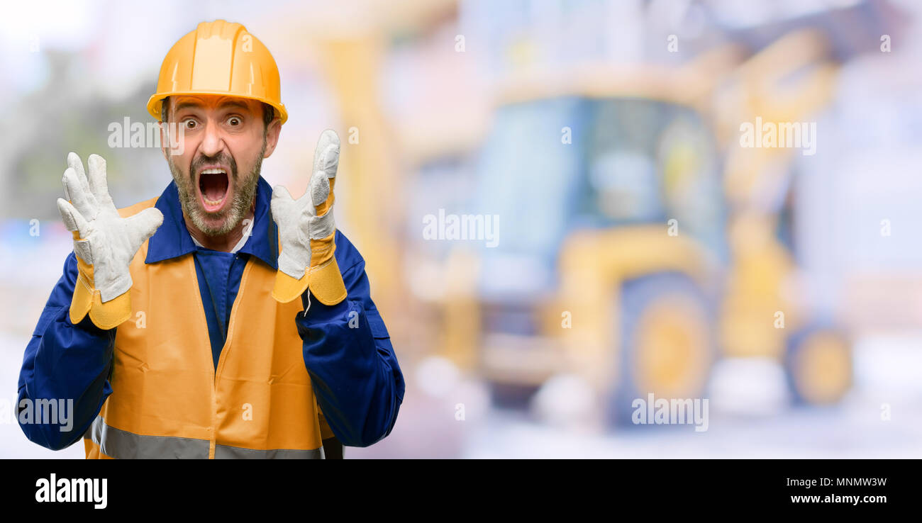 Senior engineer man, construction worker stressful keeping hands on ...