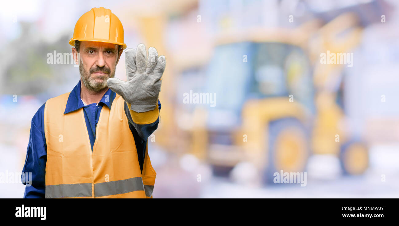 Senior engineer man, construction worker annoyed with bad attitude ...