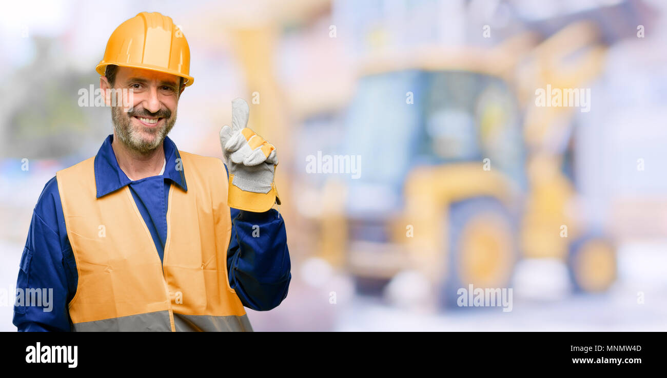 Senior engineer man, construction worker pointing away side with finger ...