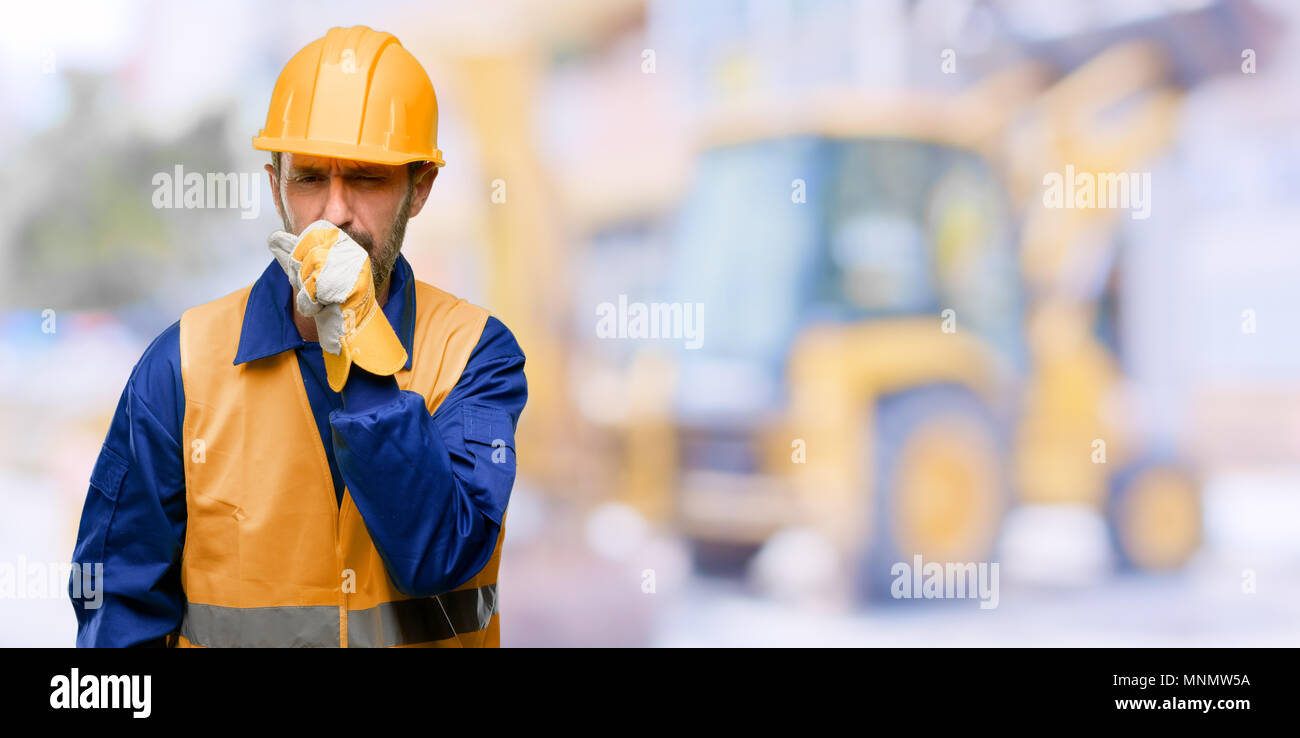 Senior engineer man, construction worker sick and coughing, suffering ...