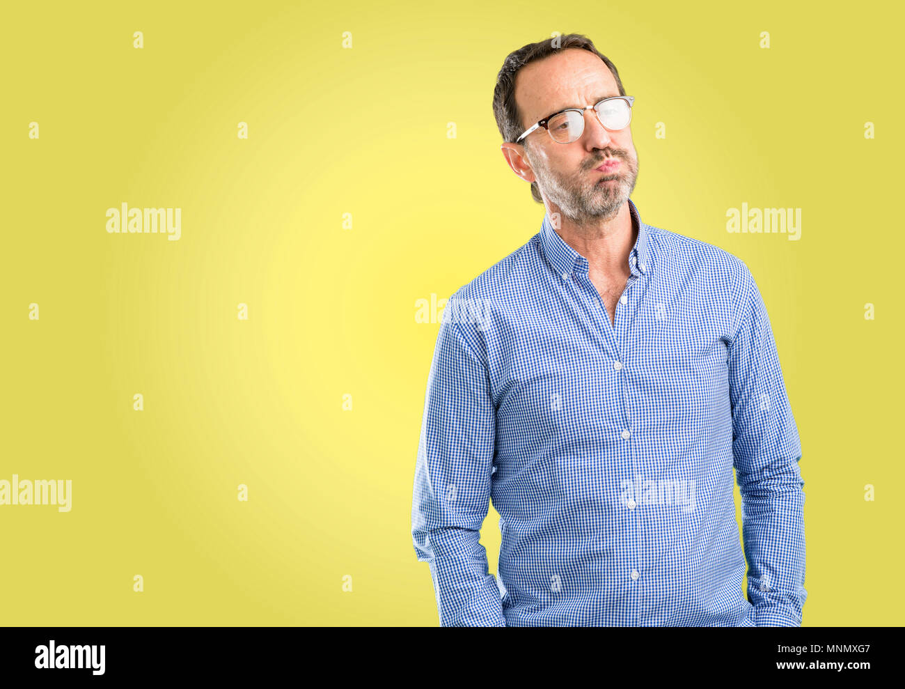 Puffing out cheeks hi-res stock photography and images - Alamy