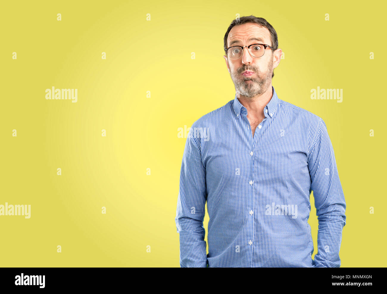 Puff out cheeks hi-res stock photography and images - Alamy