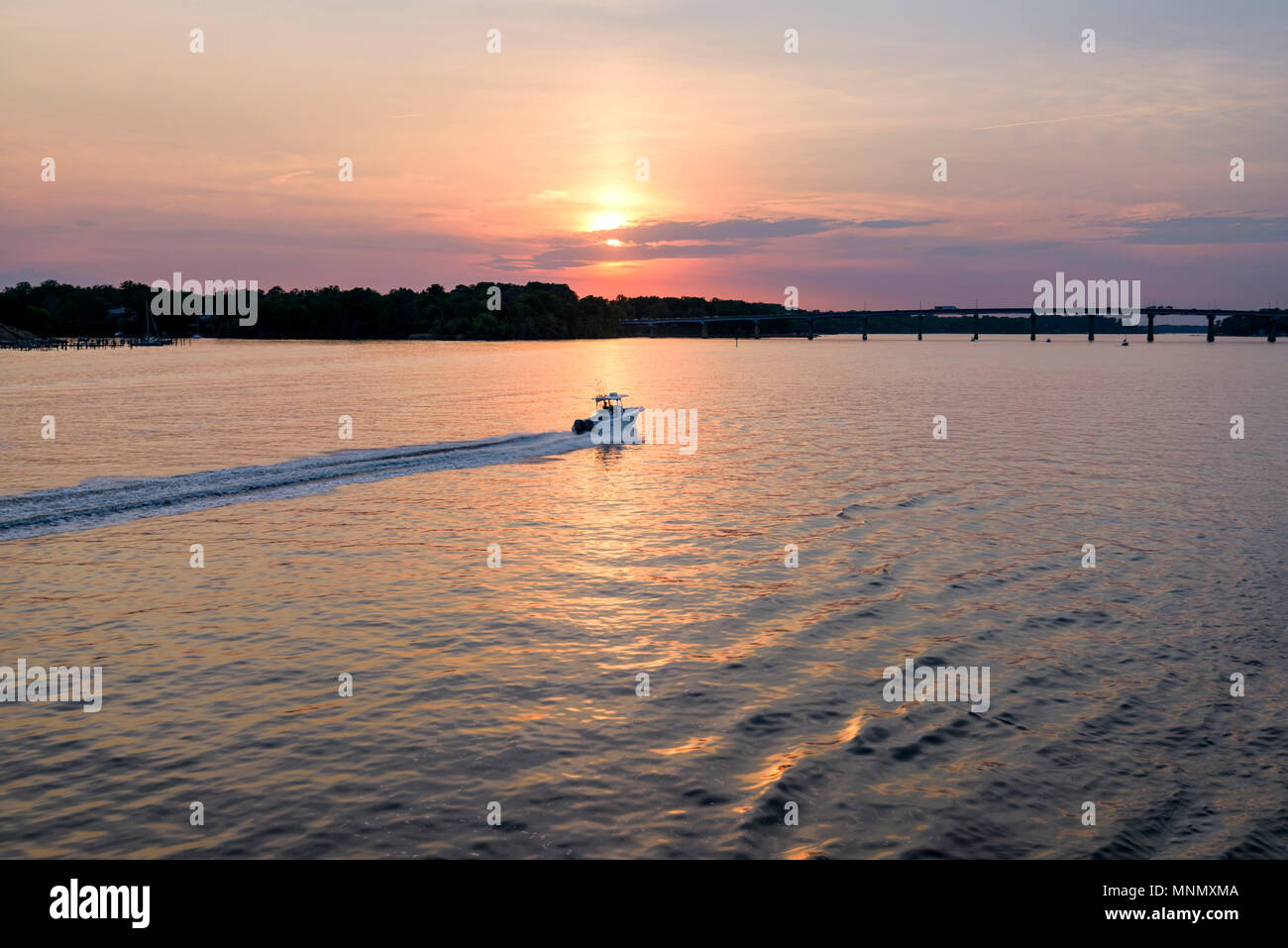A speedboat travels on the Severn River near Annapolis, Maryland Stock ...