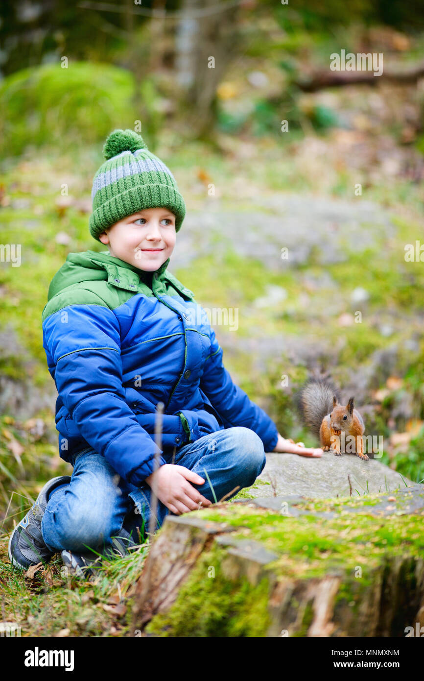 Boy with squirrel hi-res stock photography and images - Alamy