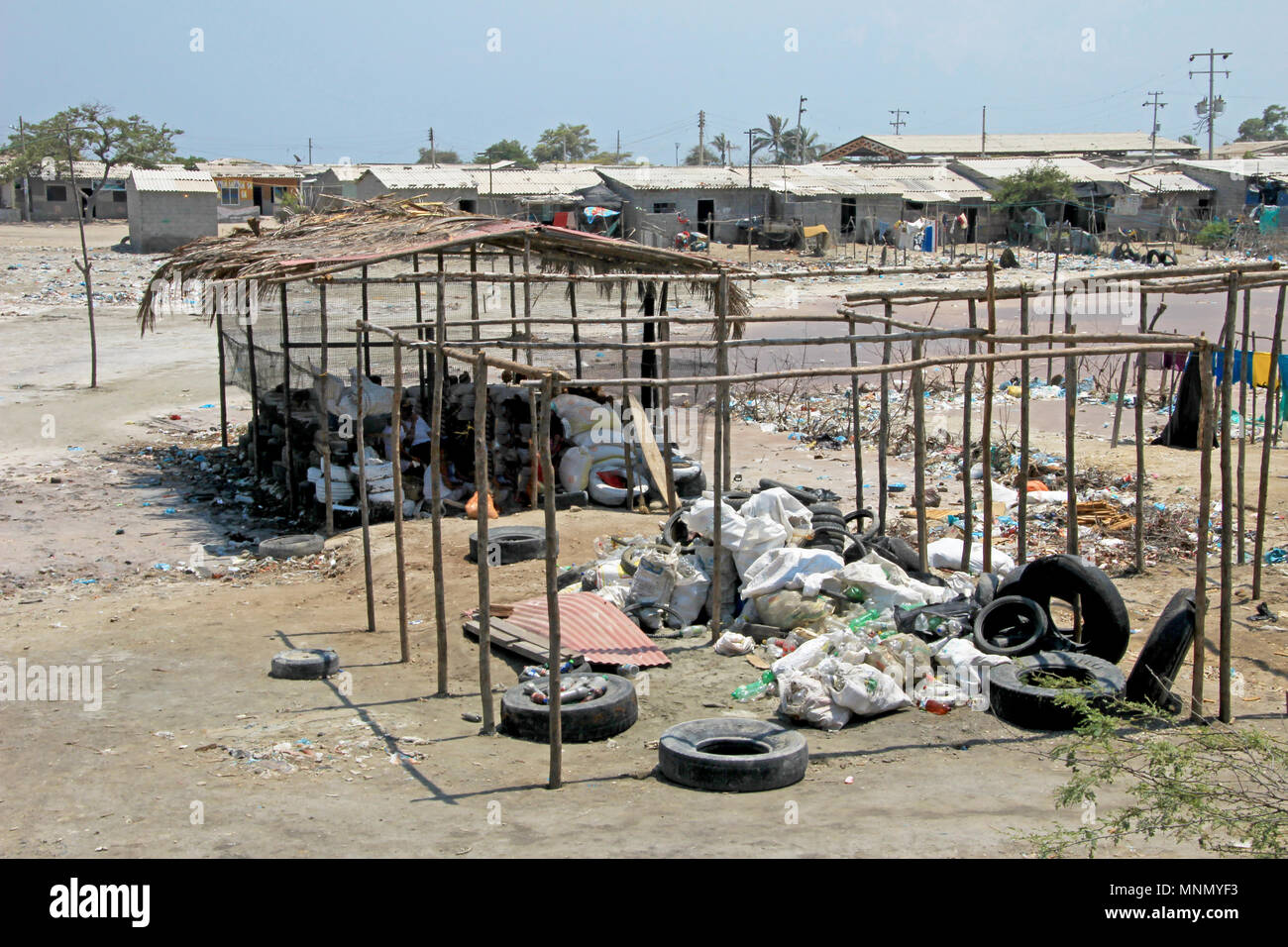 Littering of garbage in front of private houses along colombian coast ...