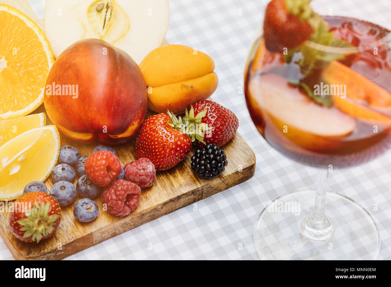 Top view of summer dinks, fruit cocktails on white wood table with ...