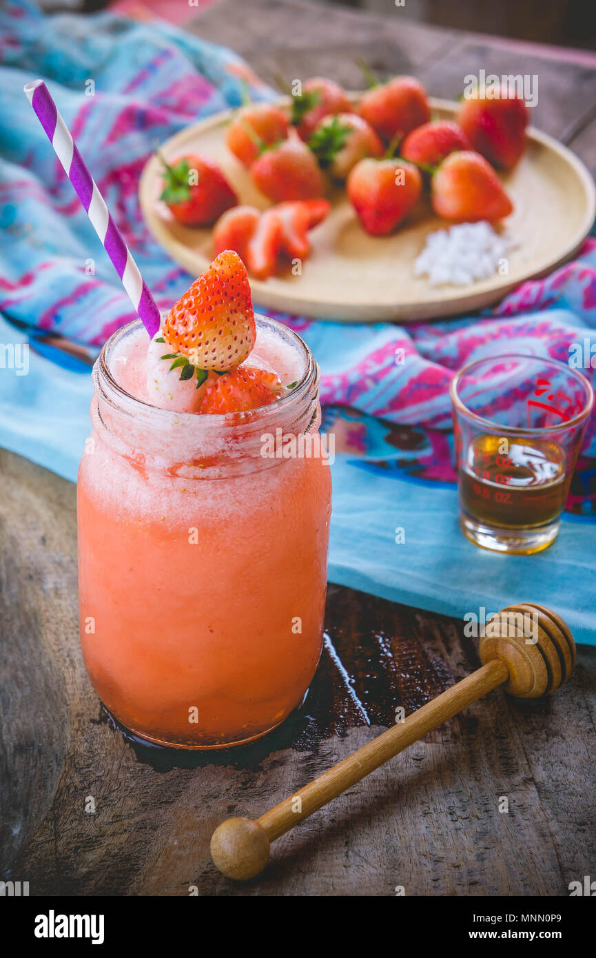 Strawberry smoothie juice , on topping honey tasty for summer on wood ...
