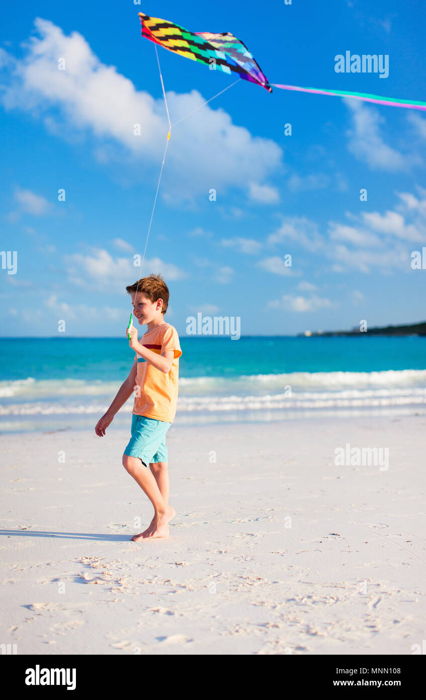 Boy flying a kite hi-res stock photography and images - Alamy