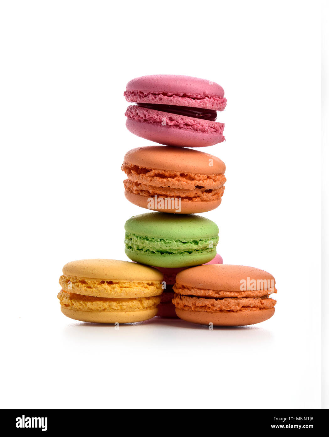 Pyramid of multi-colored macaroons isolated on white background Stock ...