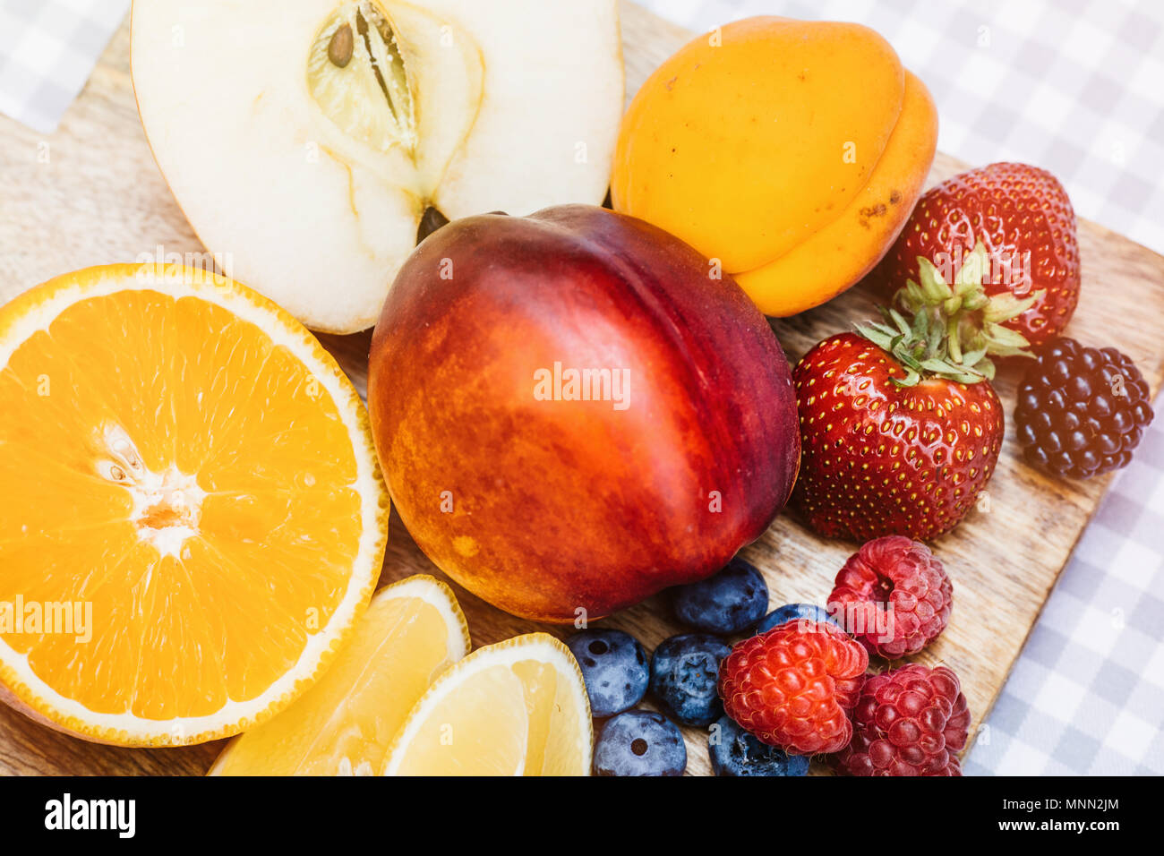 Top view of summer dinks, fruit cocktails on white wood table with ...