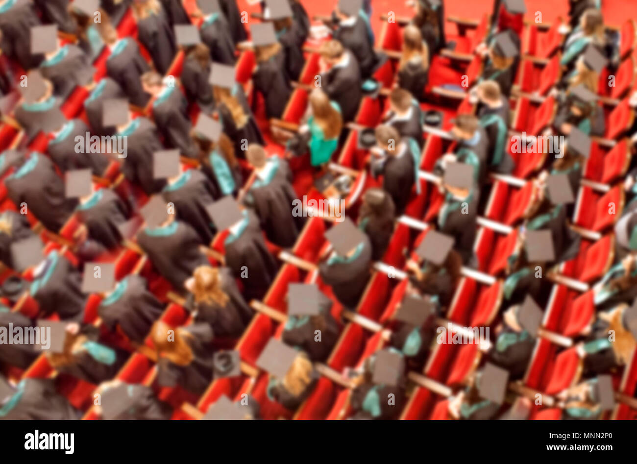 many young people at graduation show. blurred image Stock Photo - Alamy