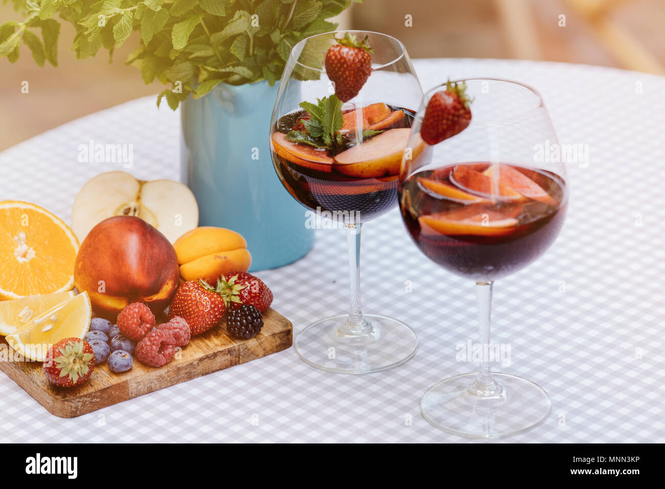 Top view of summer dinks, fruit cocktails on white wood table with ...