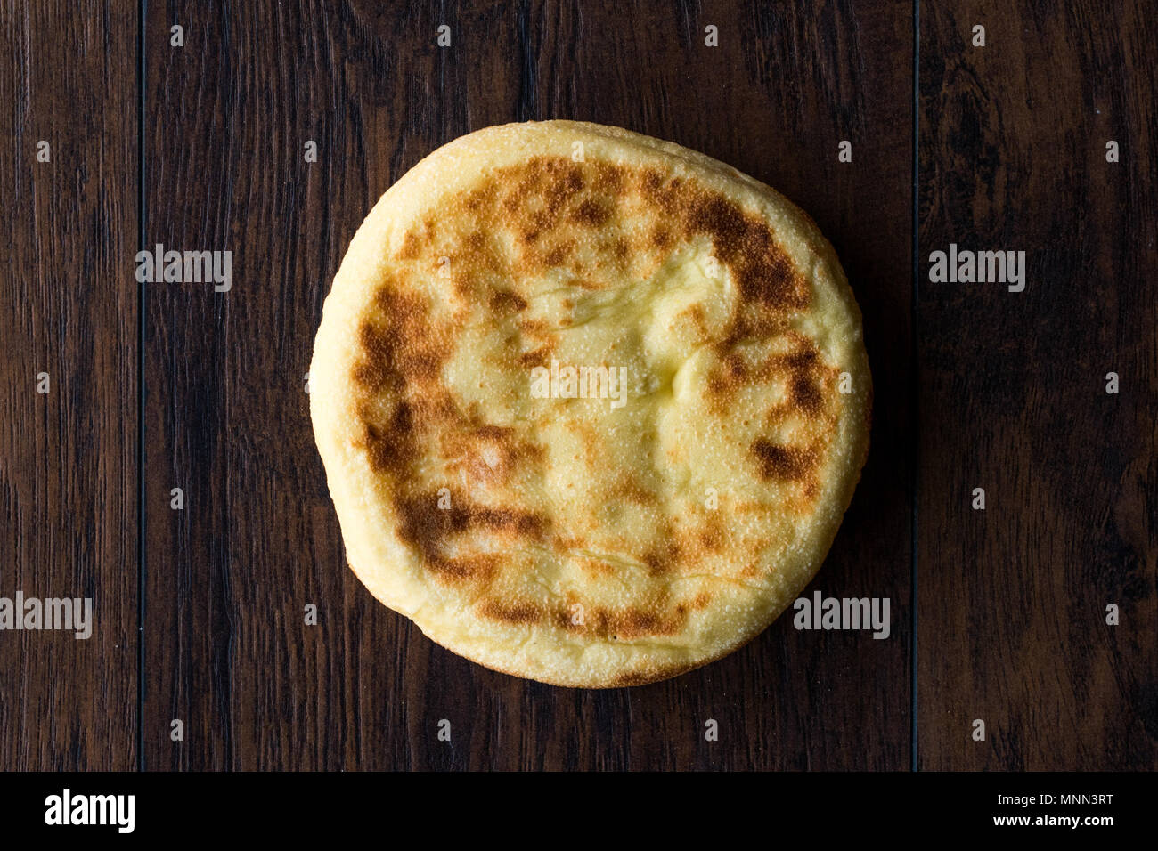 Turkish Flat Bread Bazlama on wooden surface. Traditional Bakery Stock ...
