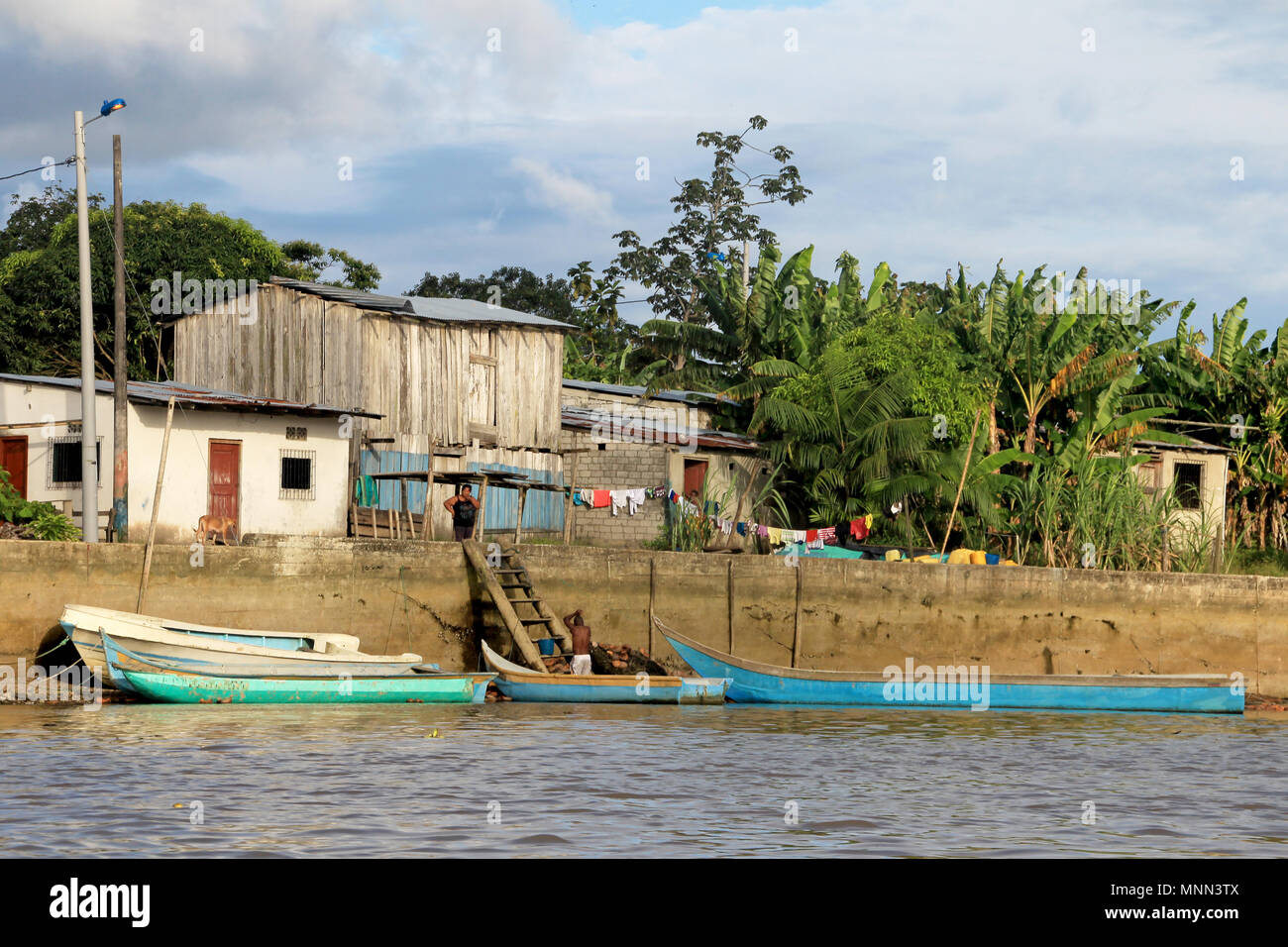 Traditional fishing boats and houses, Cayapas River, Esmeraldas ...