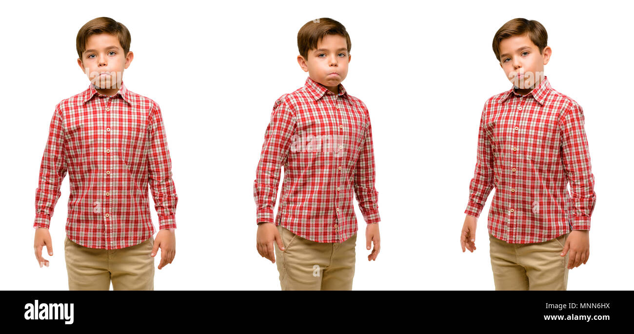 Handsome toddler child with green eyes puffing out cheeks, having fun ...