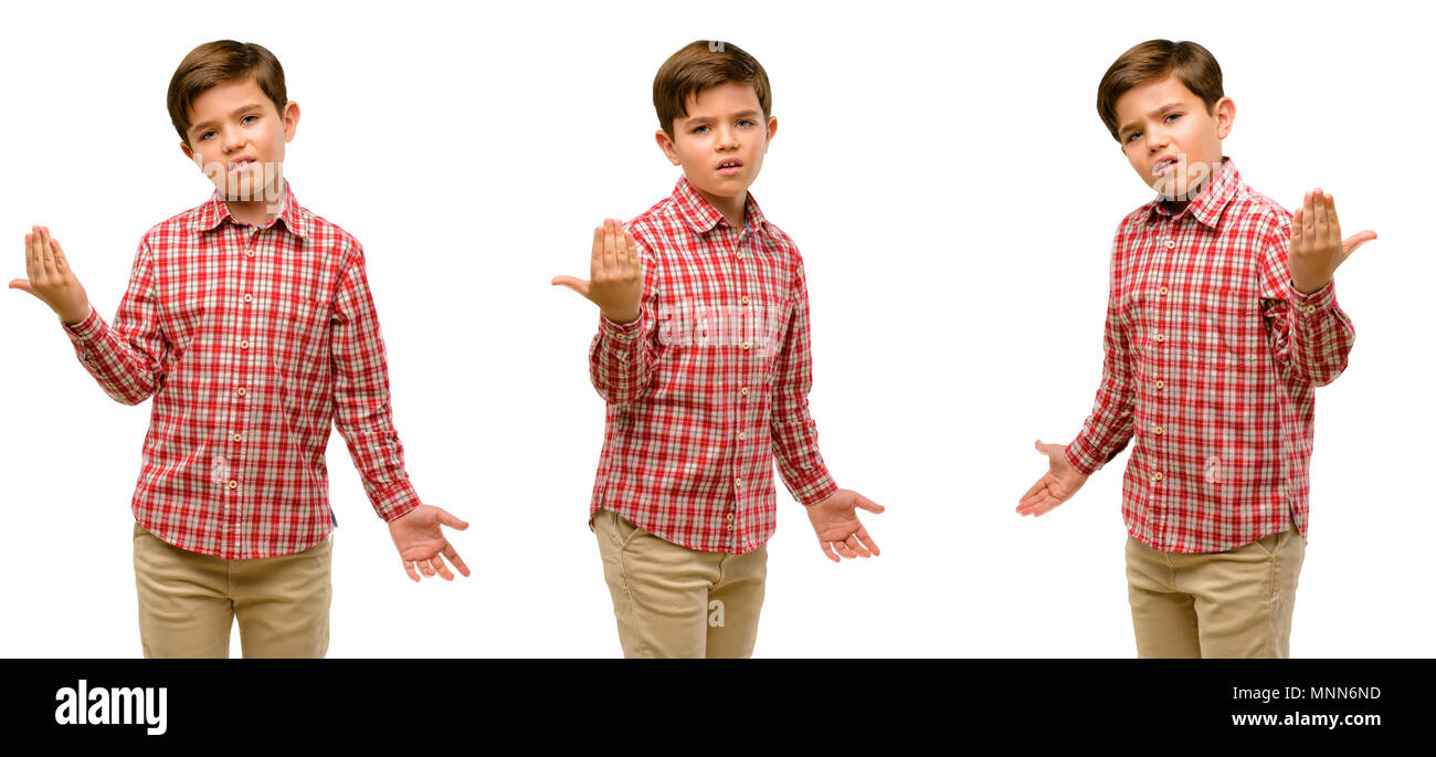 Handsome toddler child with green eyes irritated and angry expressing ...