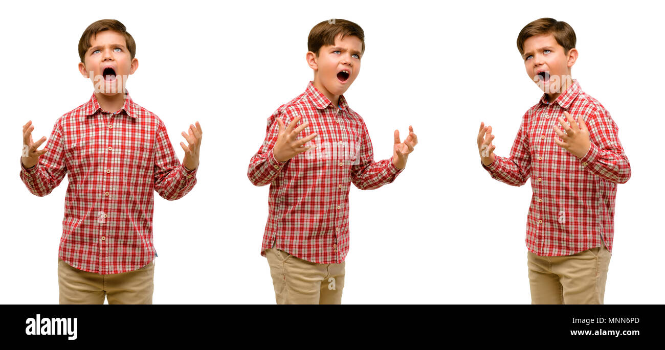 Handsome toddler child with green eyes terrified and nervous expressing ...